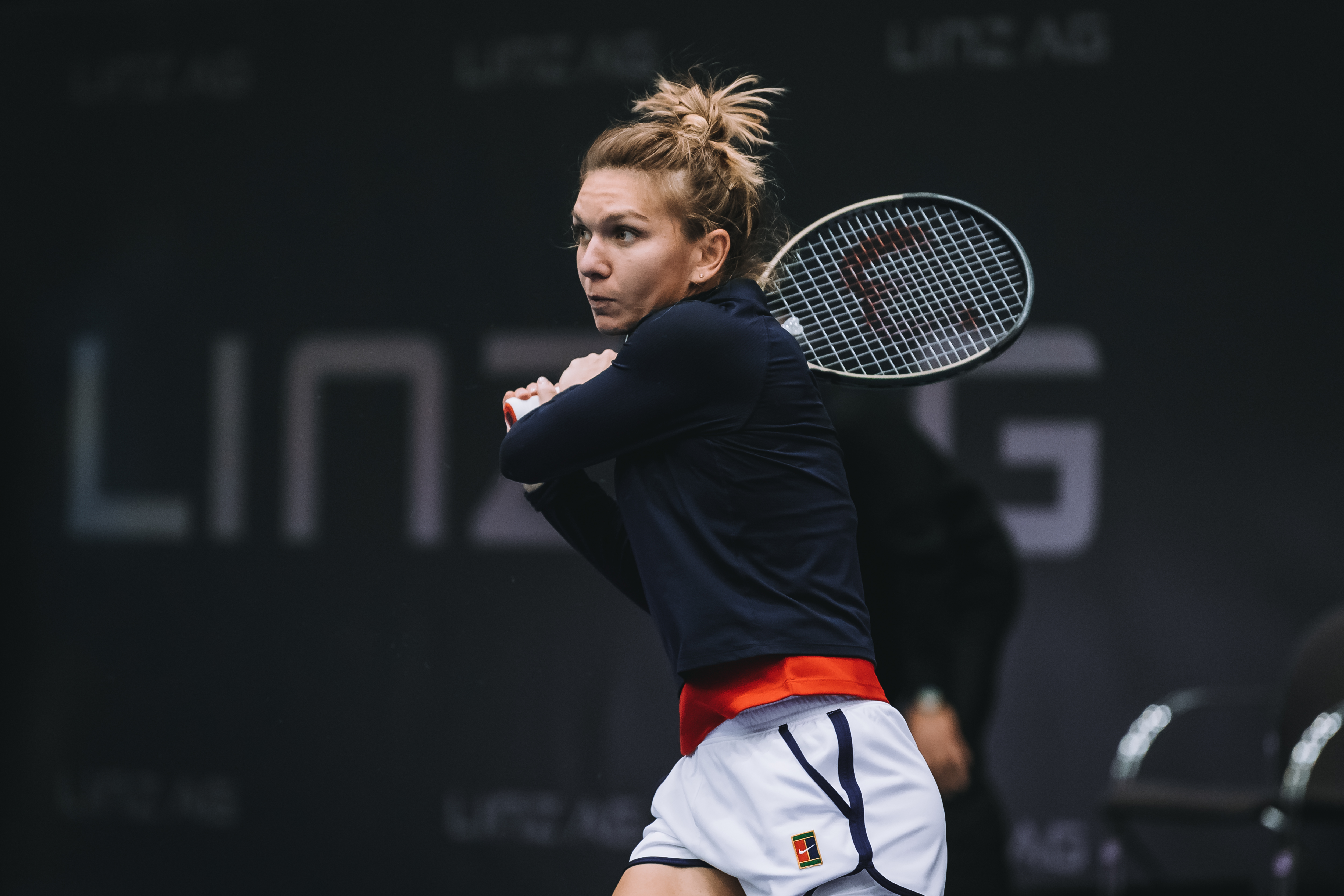 Halep comes back from the brink to beat Paolini in Linz; to face ...