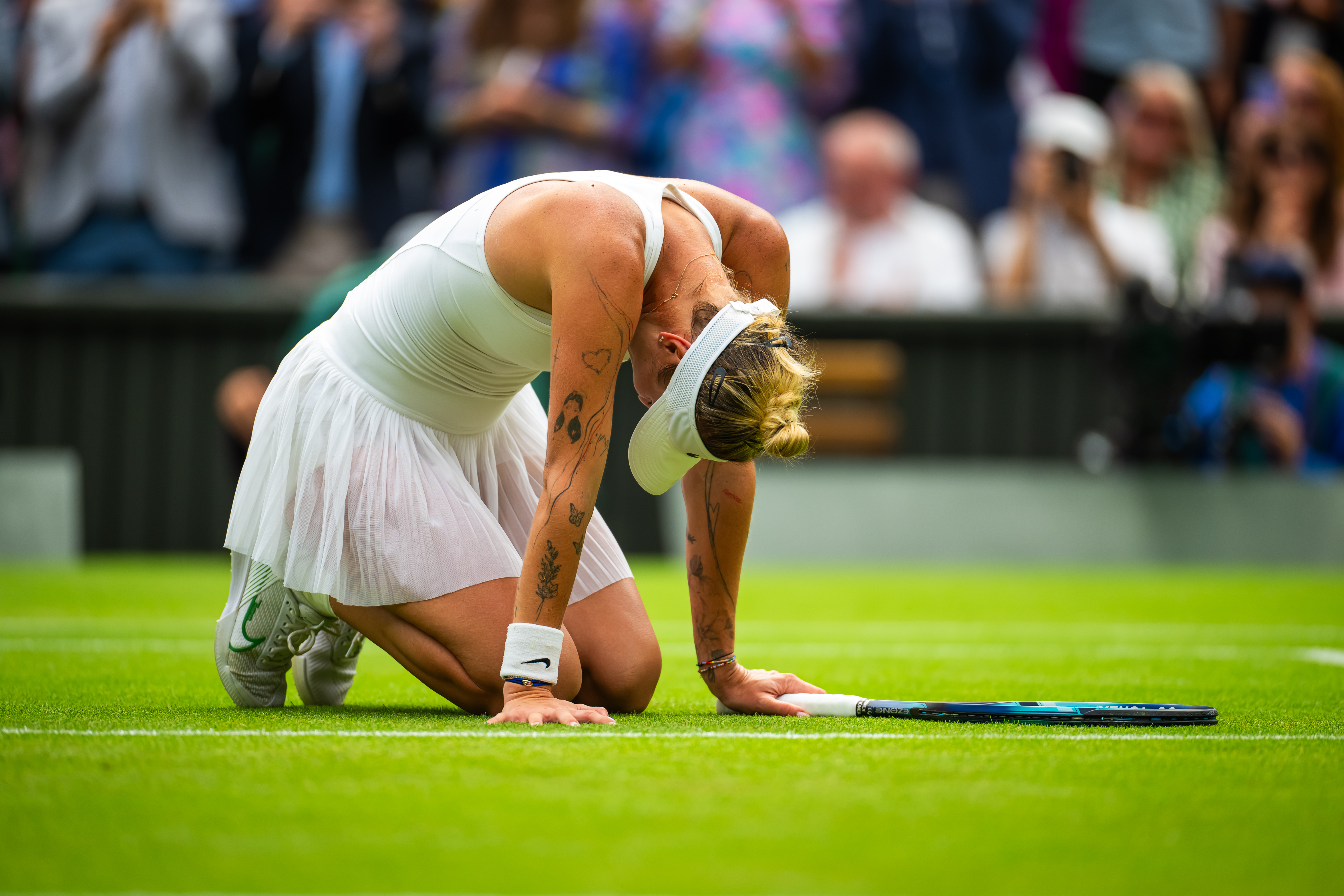 Vondrousova defeats Jabeur at Wimbledon; wins first Grand Slam title