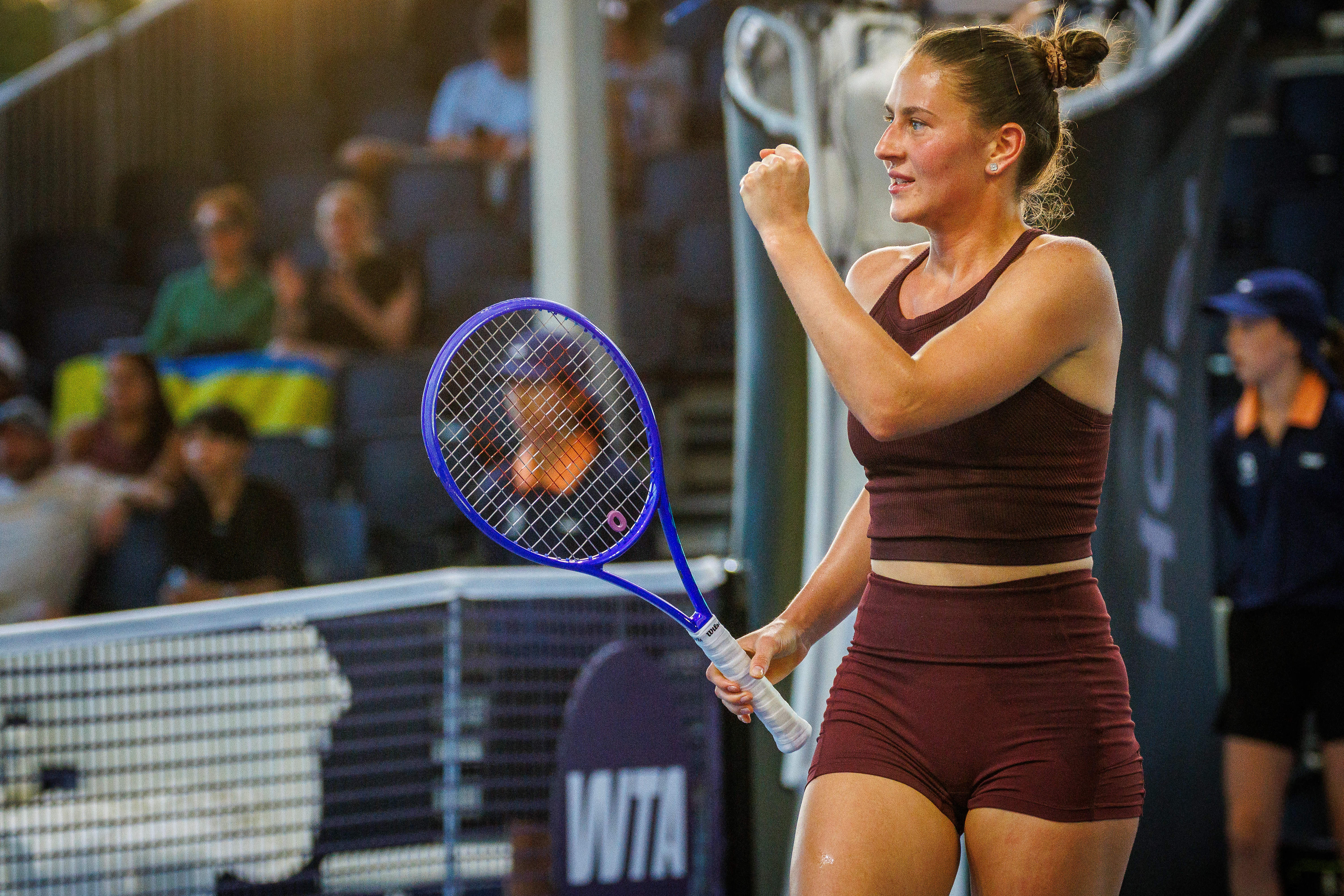 Hot shot: Marta Kostyuk's scramble up, down and back up the Brisbane court