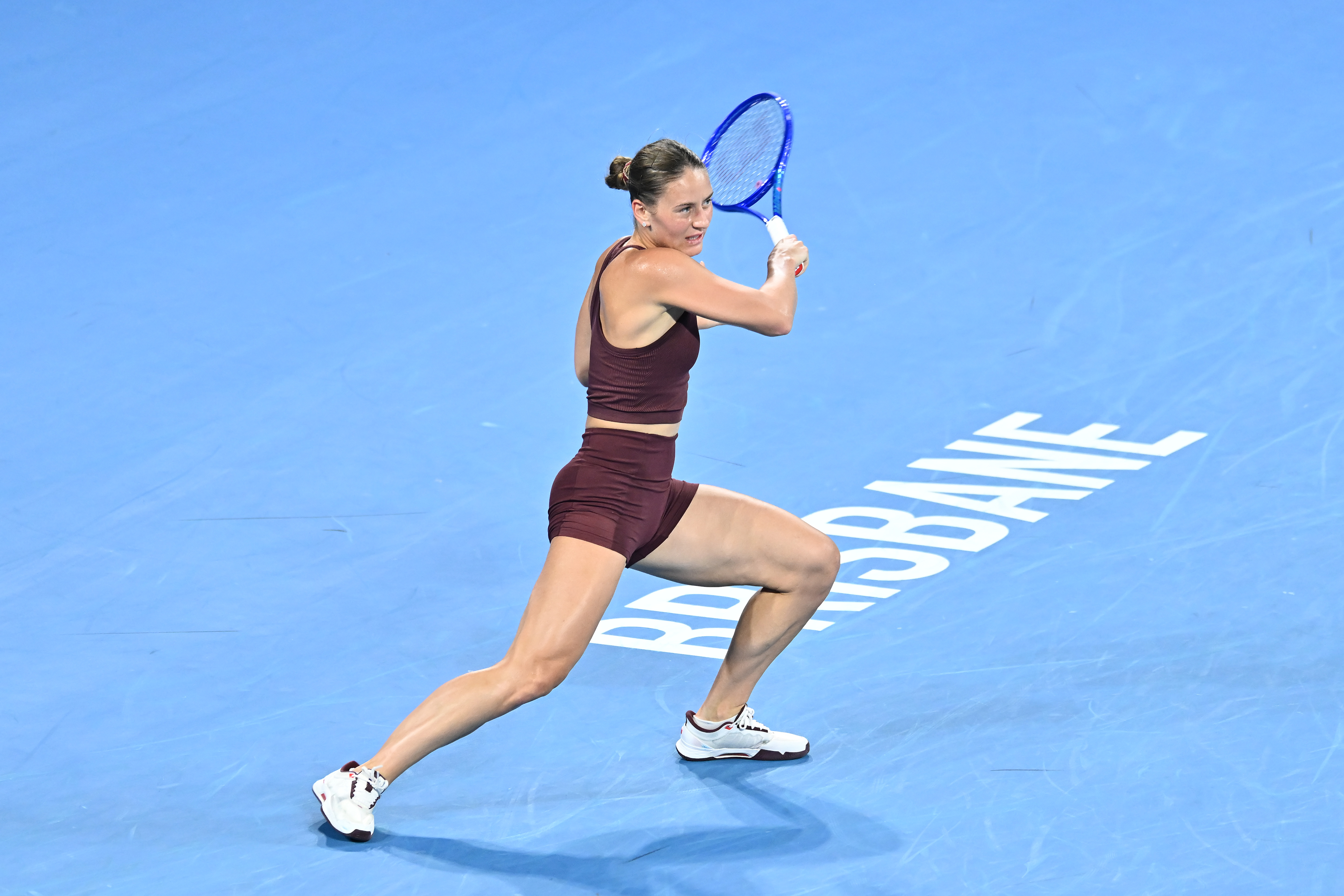 Hot shot: Marta Kostyuk breaks in Brisbane with absurd angled pass