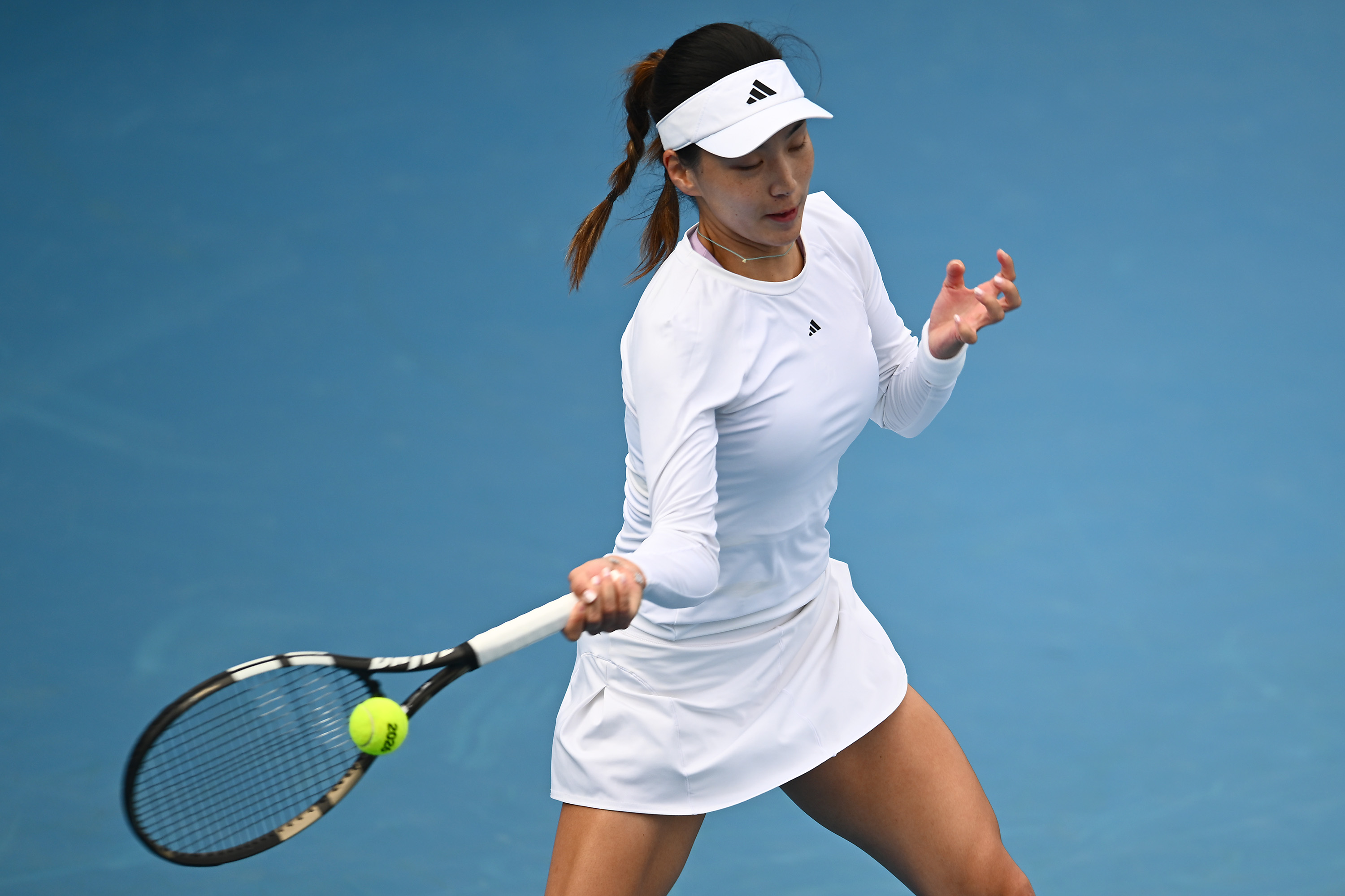 Wang Xinyu powers past wild card Gibson in Hobart first round