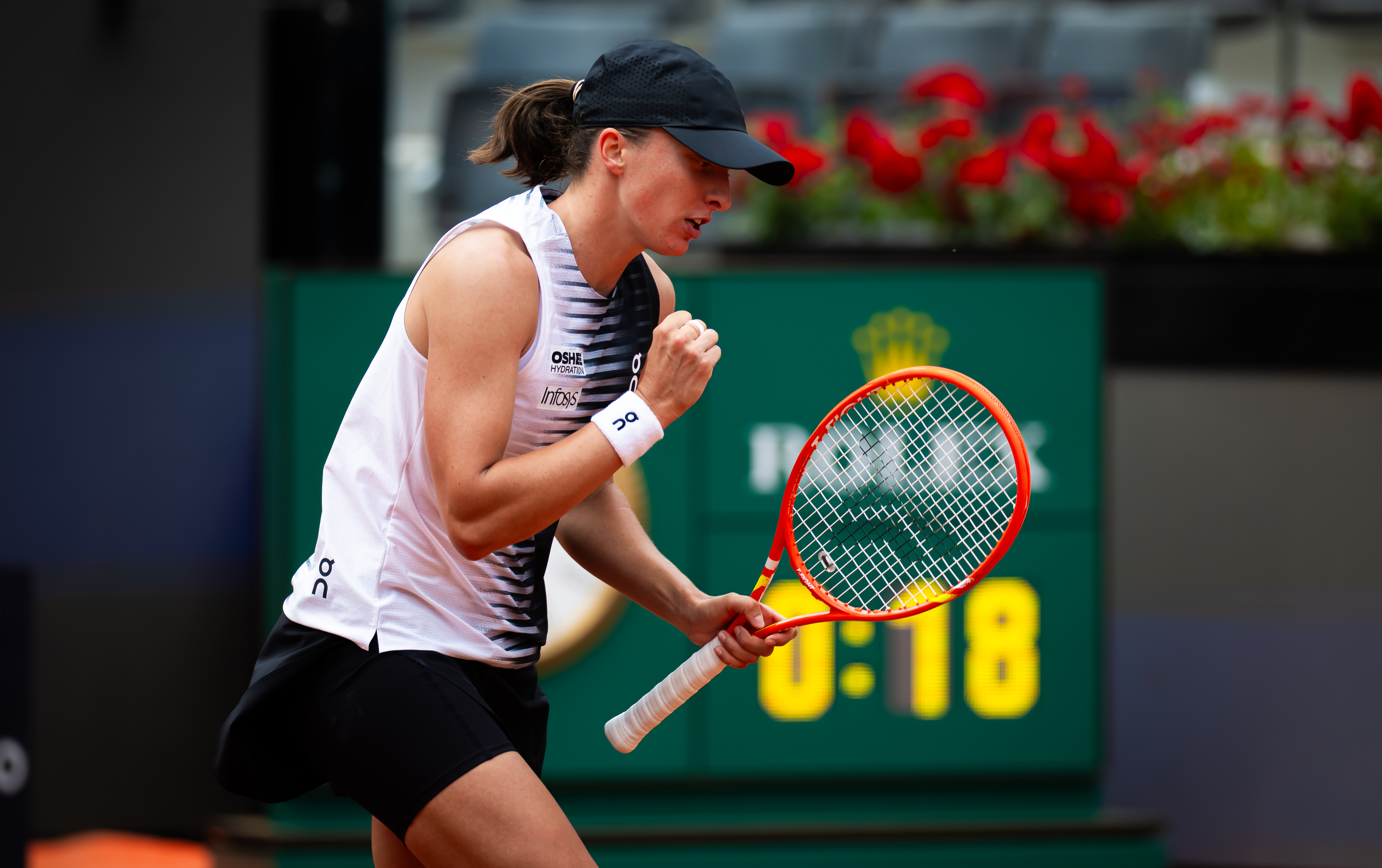 Swiatek survives McNally in three sets to reach Rome third round